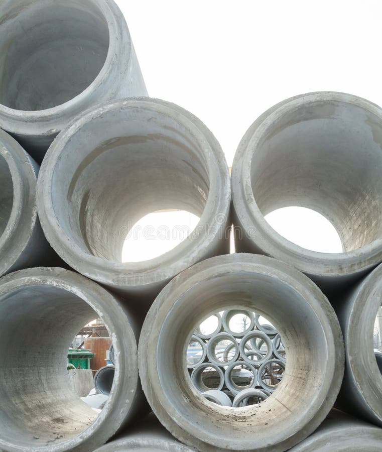 Stack of New Concrete Pipes Stock Photo - Image of canalization ...