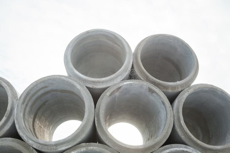 Stack of New Concrete Pipes Stock Image - Image of large, diameter ...
