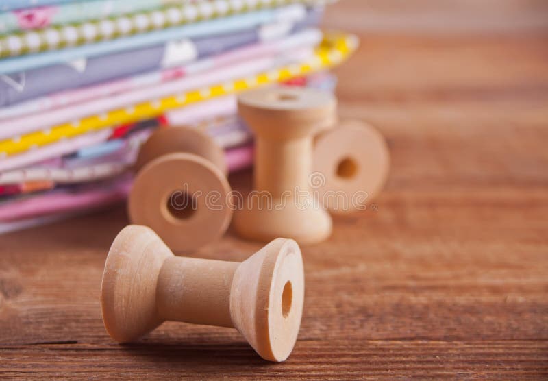 Stack of of New Fabrics in Different Colors Cloth with Empty Wooden ...