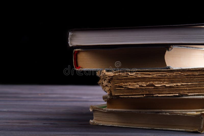 Stack of New and Old Books on Wooden Table. Stock Photo - Image of heap ...