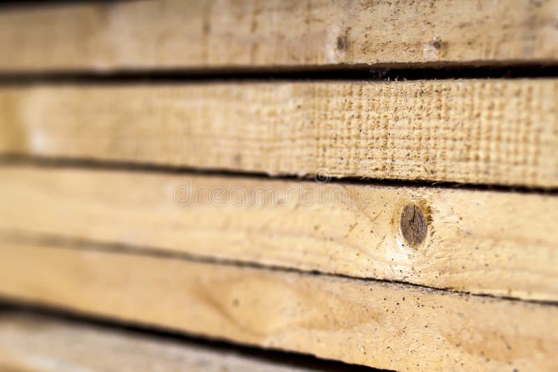 Stack of New Wooden Studs at the Lumber Yard. Wood Timber Construction ...