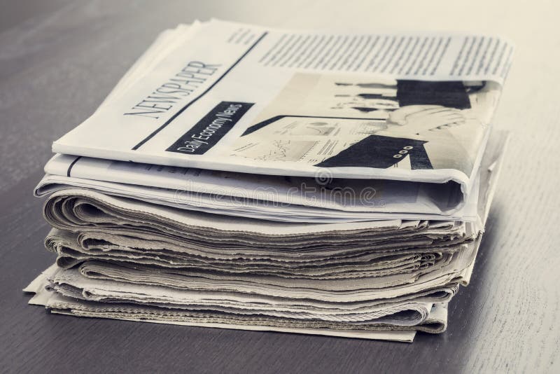 Stack of Newspaper on Wooden Table Stock Image - Image of news, media ...