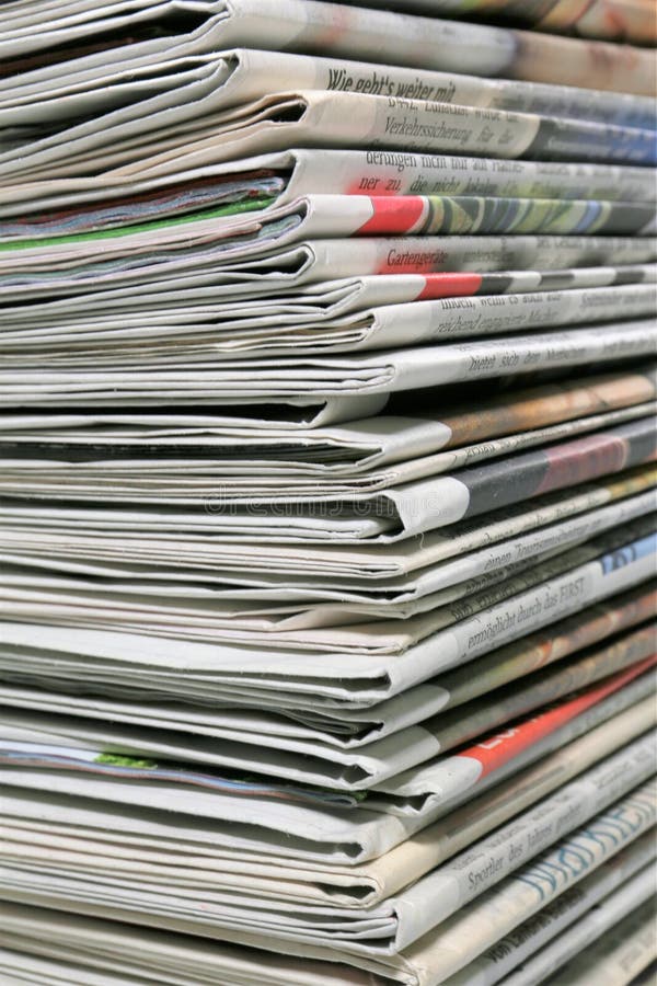 Stack of newspapers stock image. Image of newspaper - 209729789