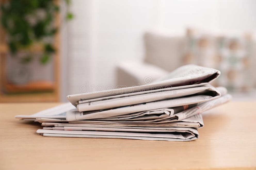 Stack of Newspapers in Different Languages on Table Indoors Stock Image ...