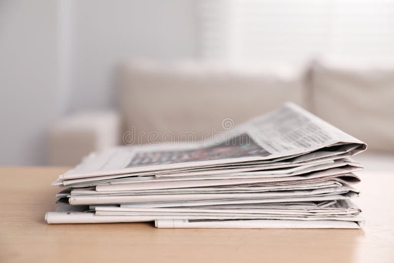 Stack of Newspapers in Different Languages on Table Indoors Stock Photo ...