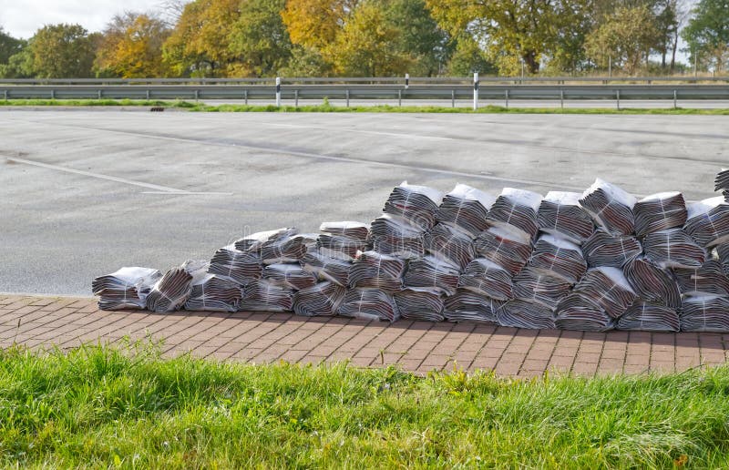 Stack Newspapers Pavement Stock Photos - Free & Royalty-Free Stock ...