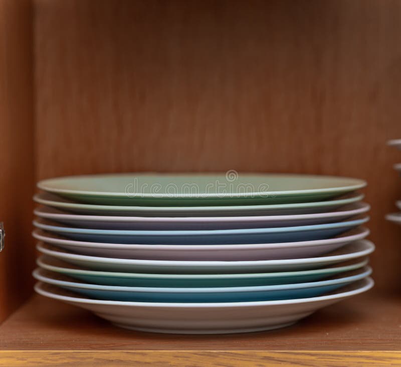 Stack of Nine Plates in Multiple Colors.. Stock Image - Image of ...