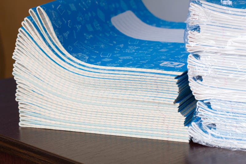 Stack of Notebooks. Back To School. a Pack of Blue School Notebooks on ...
