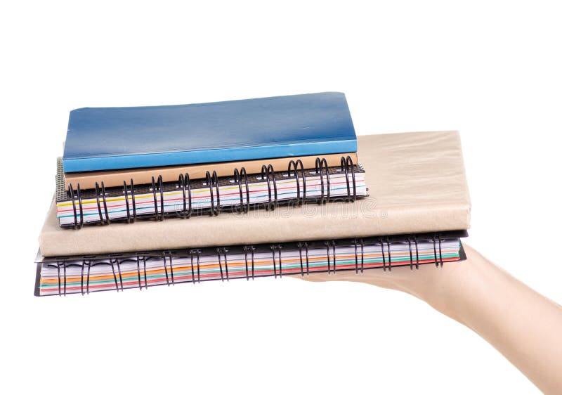 Stack notebooks in hand stock photo. Image of drawing - 129509070
