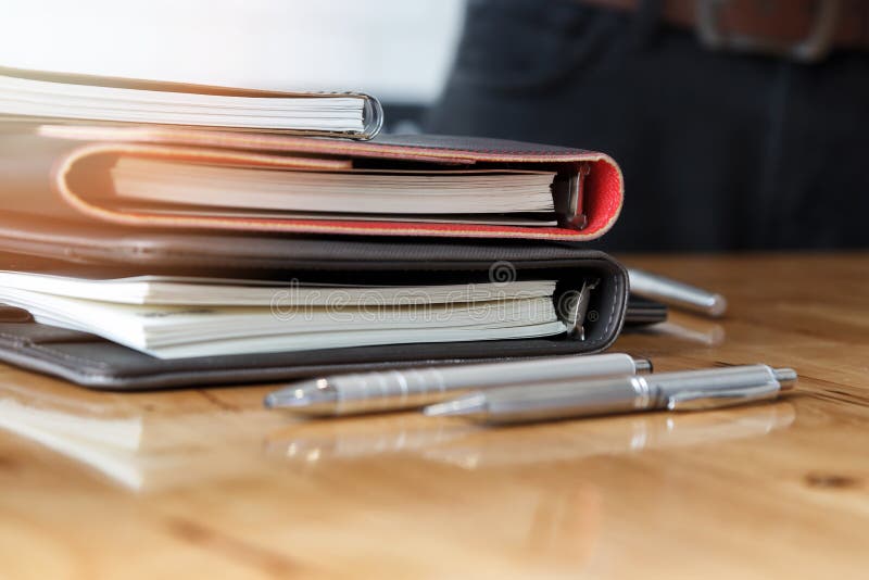 Stack of Notebooks and Pens on Office Desk Stock Image - Image of ...
