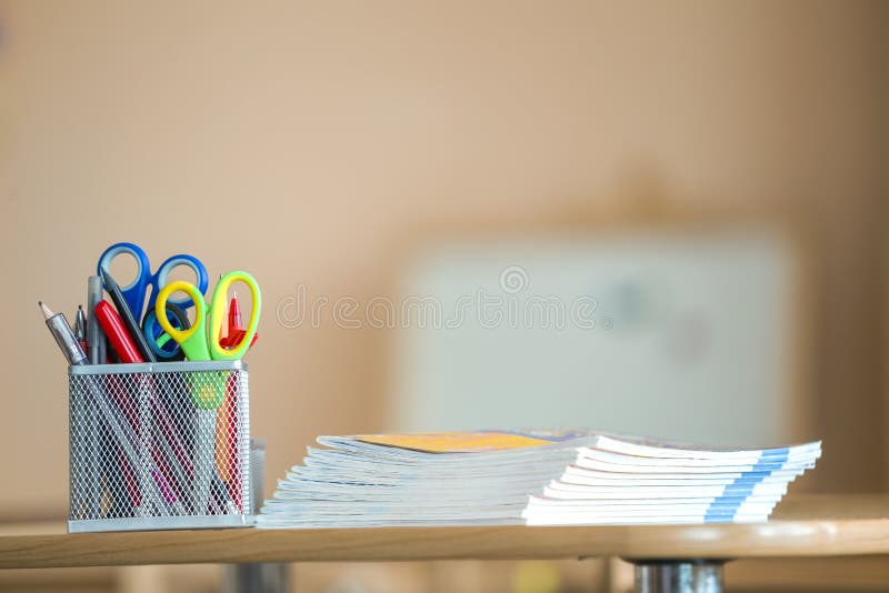 Stack of Notebooks and Stationery Arrangement in Classroom or Office on ...