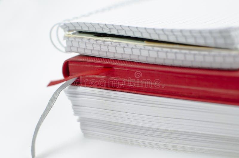 Stack of Notebooks is on a White Background Stock Photo - Image of ... Stack of Notebooks is on a White Background Stock Photo - Image of ...
