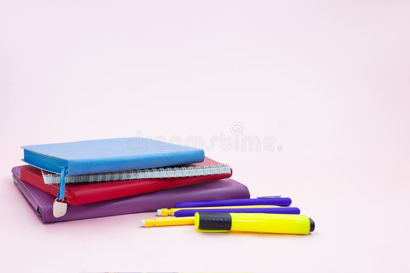 Stack of Notepads with Pen and Marker on Pink Table. Back To School ...