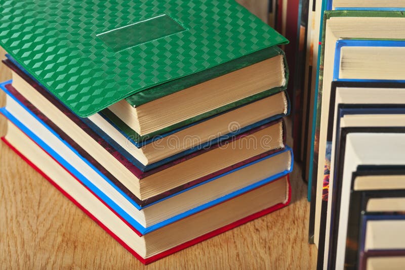 Stack and a Number of Books on a Wooden Surface Stock Photo - Image of ...