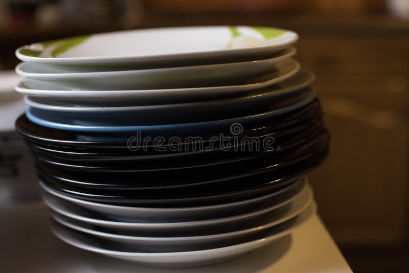 Stack of Odd Plates in Kitchen Stock Photo - Image of background ...