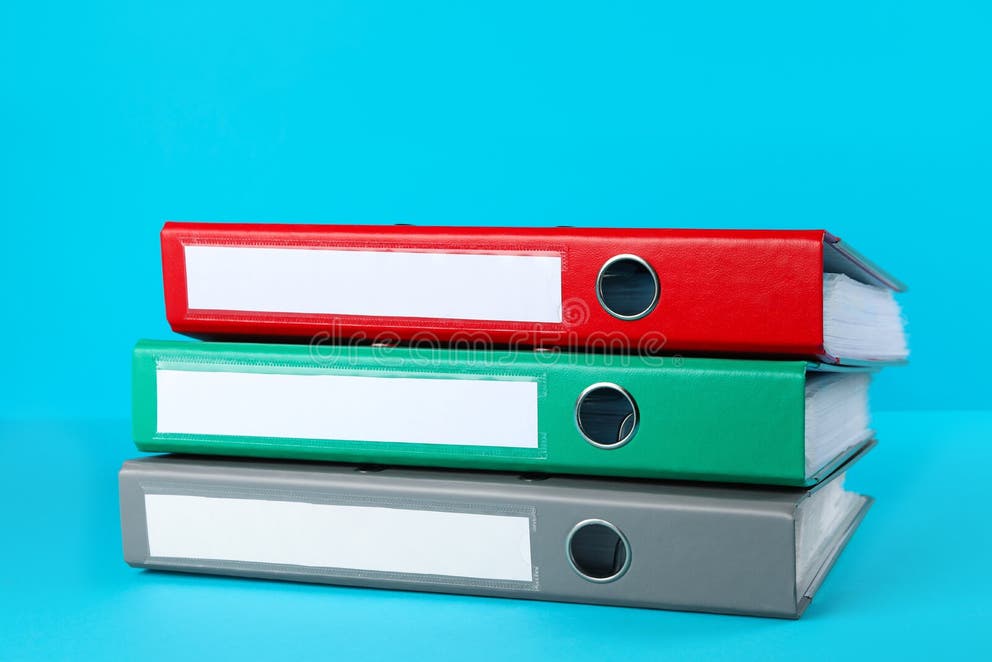 Stack of Office Folders on Light Blue Background Stock Image - Image of ...