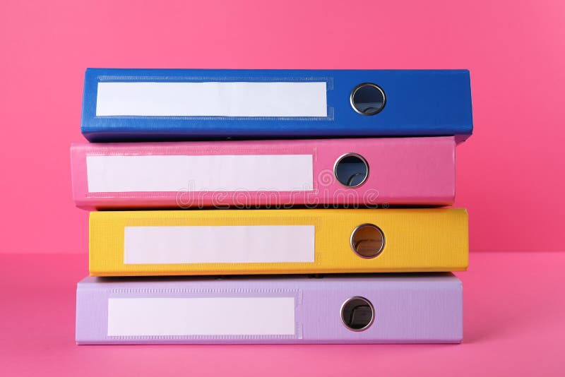 Stack of Office Folders on Pink Background Stock Photo - Image of ...