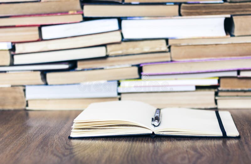 Stack of Old Book, Open Notebook and Pen. Education Concept Background ...