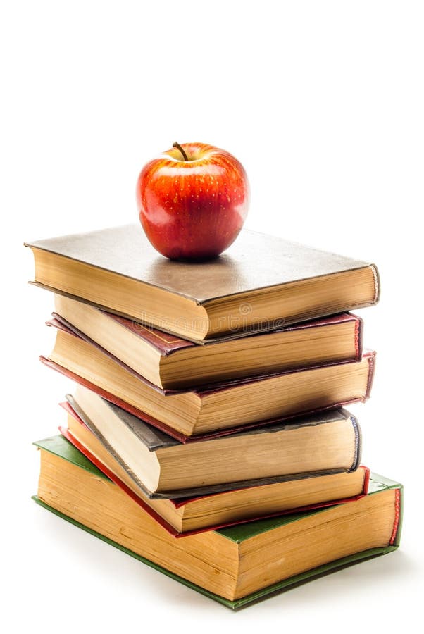 Stack of Old Books with an Apple on Top Stock Photo - Image of ...