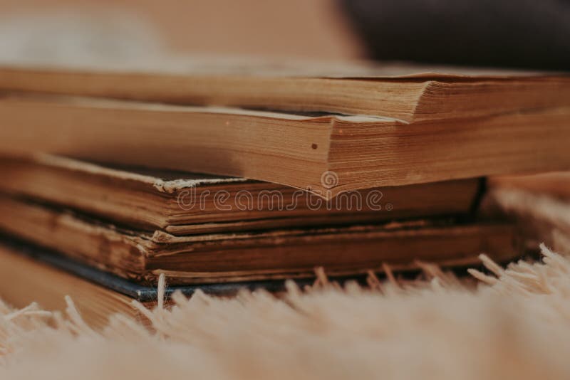 A Stack of Old Books on a Cozy Fluffy Beige Blanket. Place for Text ...