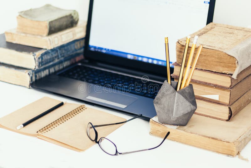 Stack of Old Books, Laptop, Glasses and Notebook, Retro Office Business ...