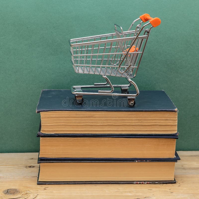 Stack of Old Books on a Shelf and Shopping Carts Stock Photo - Image of ...