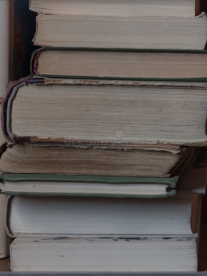 A Stack of Old Books on the Shelf. Texture Pages of Old Books Close Up ...