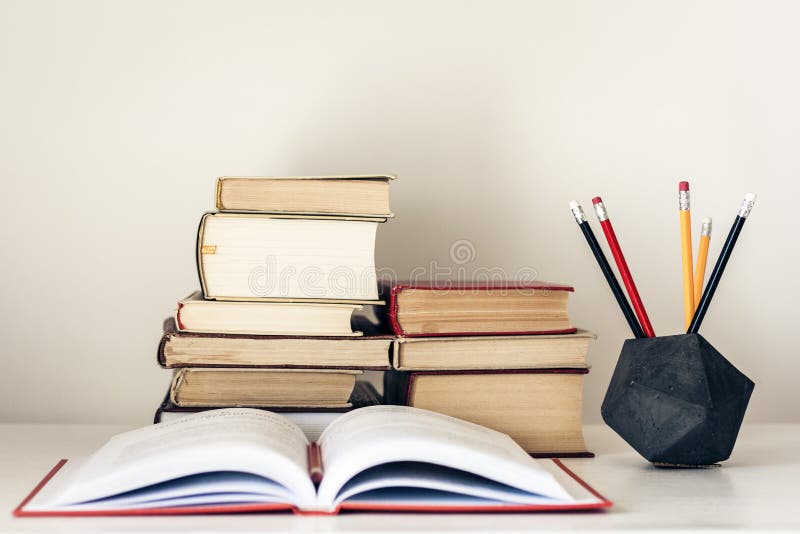 Stack of Old Books, Textbook and Pencils in Office Background for ...