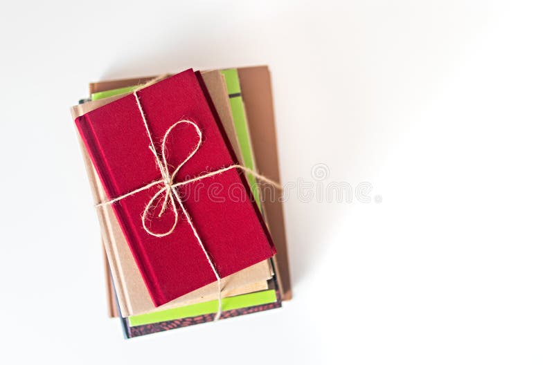 Stack of Old Books Tied with String on a White Background Stock Image ...