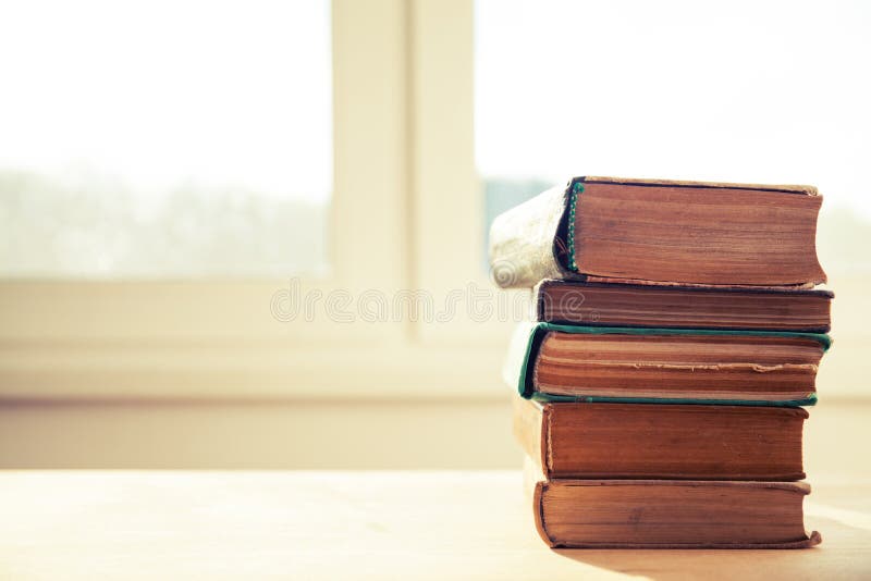Stack of Old Books on Wood Desk Stock Photo - Image of coconut ...