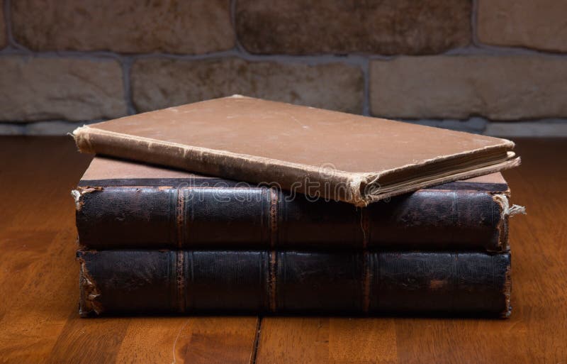 Old books on table stock photo. Image of brick, texture - 164930220