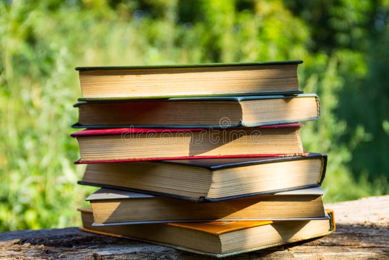Stack of the Old Books on Wooden Table Stock Image - Image of ...