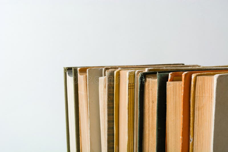 A Stack of Old Books. Yellow Frayed Pages. Worn Damaged Book Covers ...