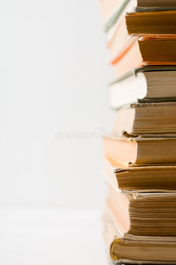 A Stack of Old Books. Yellow Frayed Pages. Worn Damaged Book Covers ...