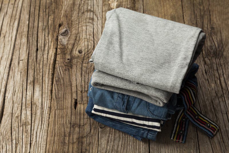 Stack of Old Clothes To Discard Declutter or Donate. Recycling Fabric ...