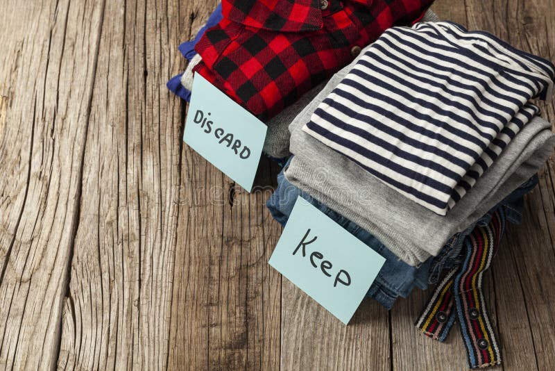 Stack of Old Clothes To Discard Declutter or Keep. Recycle Clothes, Eco ...