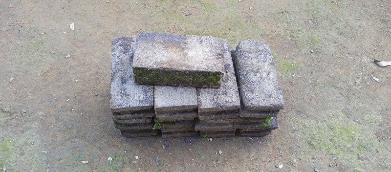 Stack of Old Concrete Paving Stones on Dirt Stock Image - Image of ...
