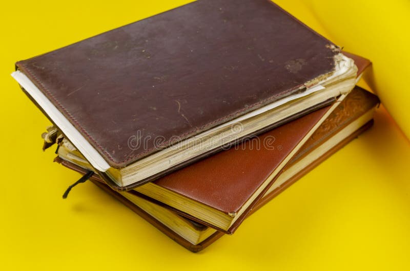 Stack of Old Diaries Lying on Yellow Background Stock Image - Image of ...
