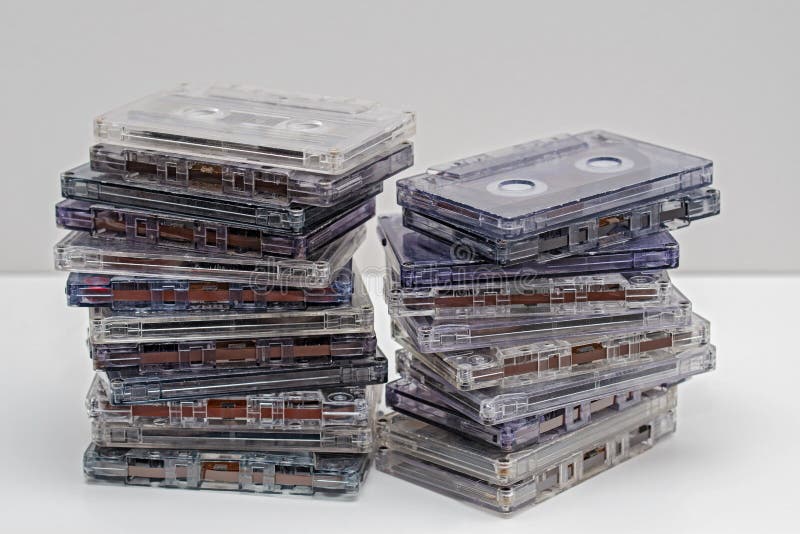 Stack of Old Dirty Audio Cassettes on the White Shelf. Stock Photo ...