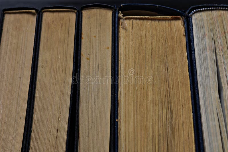 A Stack of Old Dusty Books Stacked on Top of Each Other Stock Photo ...