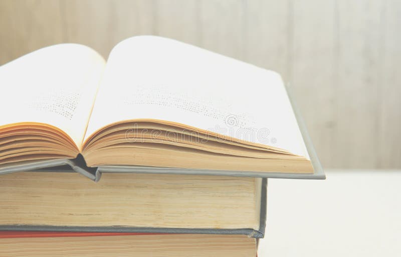 Stack of Old Hardback Books and Open Book. Many Books Piles. Hardback ...