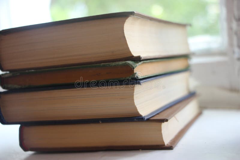 Stack of Old Hardcover Books on a Wooden Surface. Knowledge Education ...