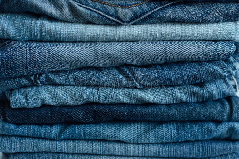 Stack of a Stack of Old Jeans Various Shades of Blue Jeans. Denim Jeans ...
