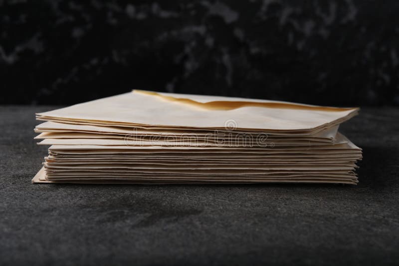 Stack of Old Letter Envelopes on Grey Table, Closeup Stock Photo ...