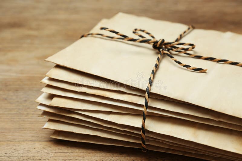 Stack of Old Letters Tied with String on Wooden Table, Closeup Stock ...