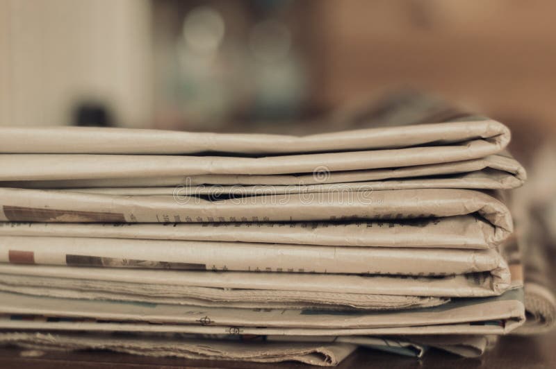 Stack of old newspapers stock photo. Image of entertainment - 56702028