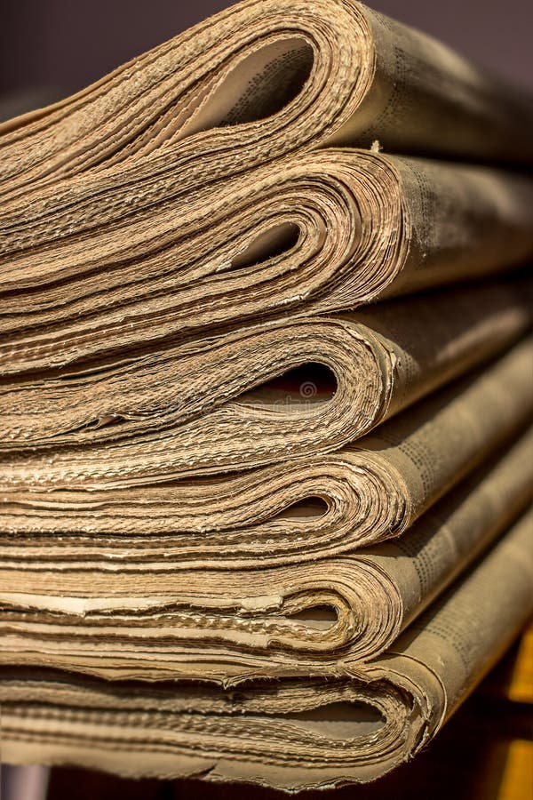 A Stack of Old Newspapers Lie on the Shelf Stock Photo - Image of ...
