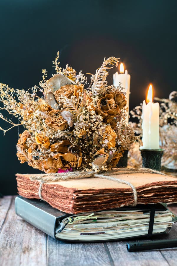 Stack of Old Papers with Dried Plants on a Wooden Table Stock Image ...