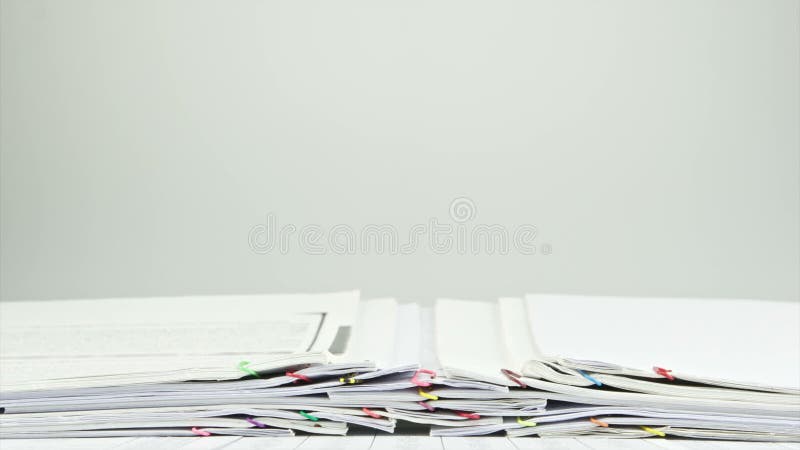 Stack Old Paperwork Report on Table Time Lapse Stock Footage - Video of ...