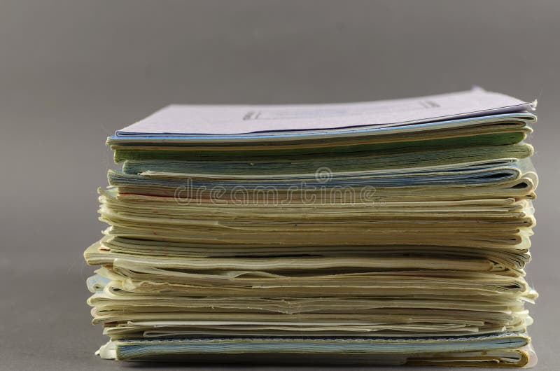 Stack of Old School Exercise Books on a Gray Background Stock Photo ...